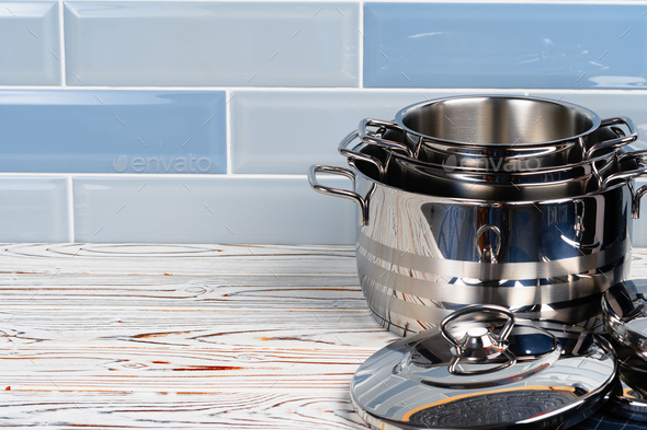 Close up photo of cookware set on kitchen counter Stock Photo by ...