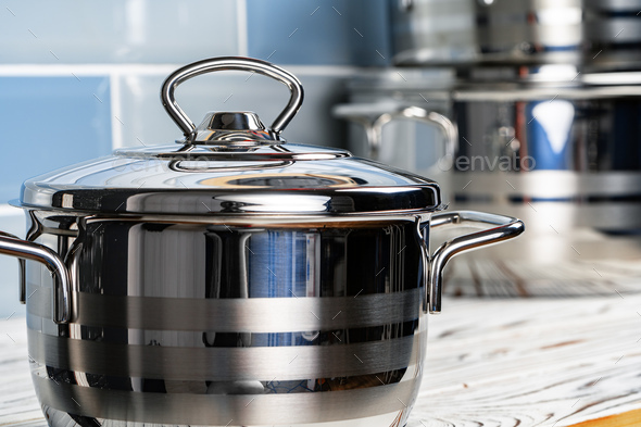 Close up photo of cookware set on kitchen counter Stock Photo by ...