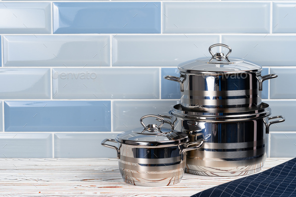 Close up photo of cookware set on kitchen counter Stock Photo by ...