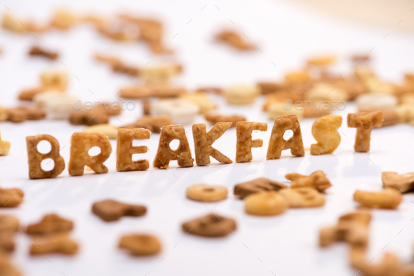 Close-up view of word breakfast and healthy breakfast cereal alphabet ...