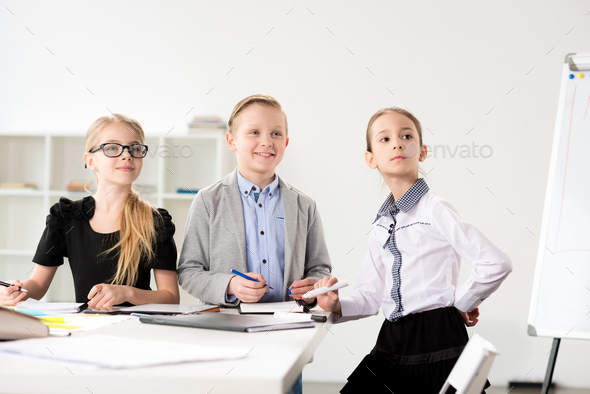 Children working in office like adult business people Stock Photo by ...