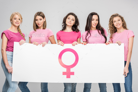 happy women holding large sign with female symbol isolated on grey ...