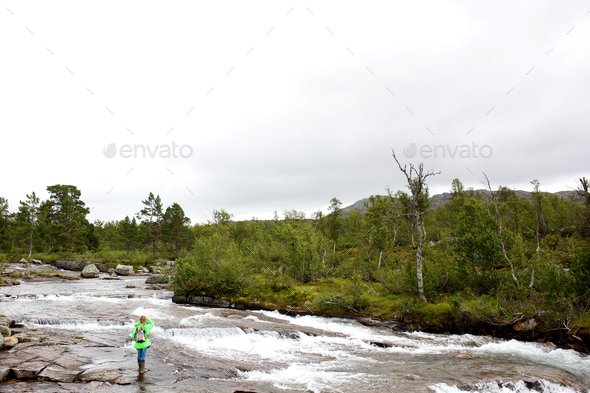 one person standing by river Stock Photo by mimagephotography | PhotoDune