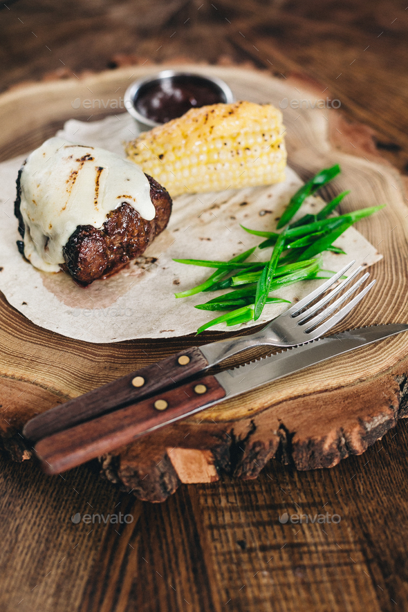 Italian recipe cooked beef filet mignon with corn, cheese and truffle ...