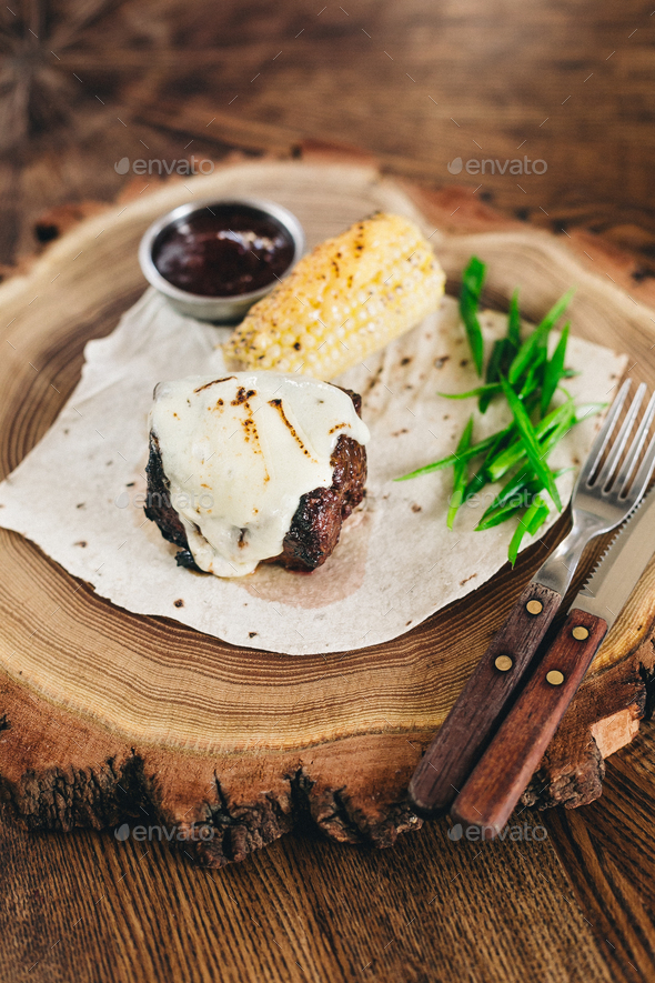Italian recipe cooked beef filet mignon with corn, cheese and truffle ...