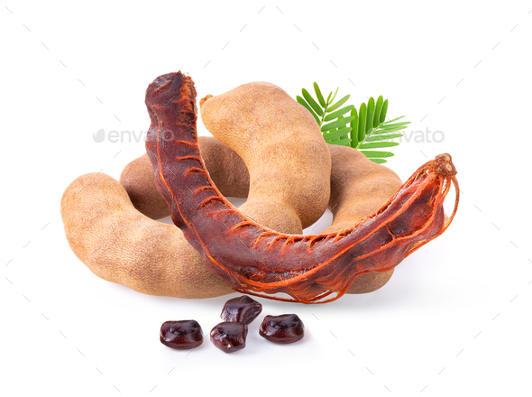 ripe tamarind with leaf isolated on white background . full depth of ...