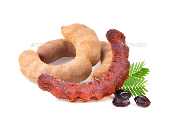 ripe tamarind with leaf isolated on white background . full depth of ...