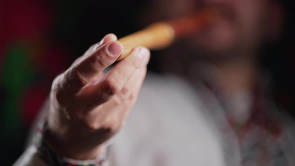 Hand of Man Playing on Woodwind Wooden Flute Ukrainian Telenka or ...