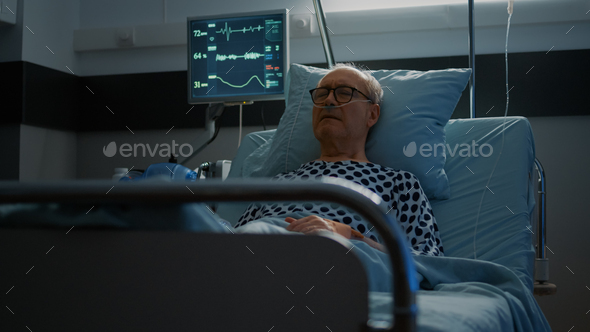 Sick elderly man with health problems staying in hospital Stock Photo ...