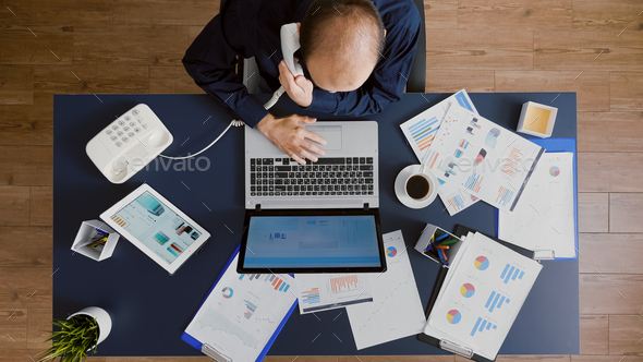 Top view of manager man planning company strategy typing management ...