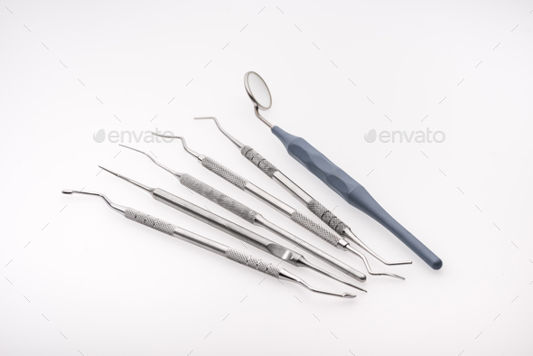 close-up view of dental probes and mirror isolated on white Stock Photo ...