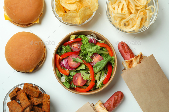Concept of fast food on white background Stock Photo by AtlasComposer