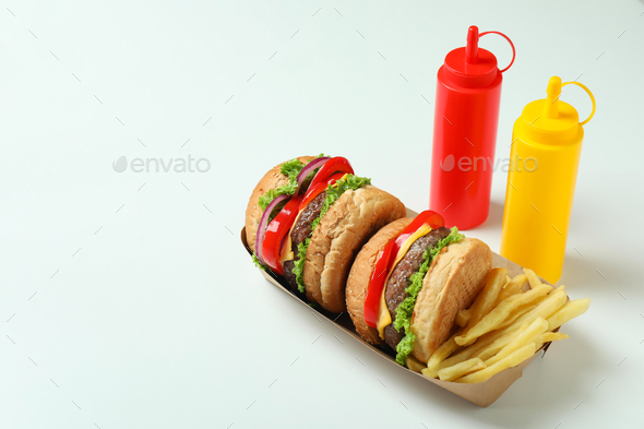 Concept of fast food on white background Stock Photo by AtlasComposer