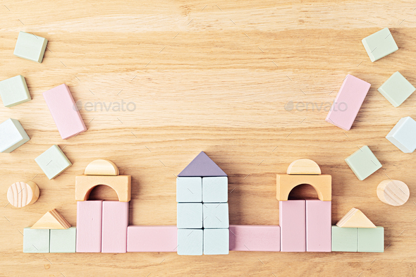Flat lay with wooden blocks in pastel colors. Eco friendly, zero waste ...
