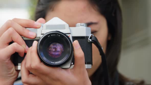 Woman clicking photo with digital camera 4k, Stock Footage | VideoHive