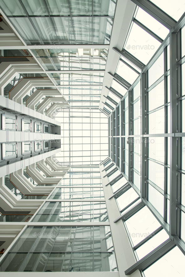 High building with big windows Stock Photo by Pressmaster | PhotoDune