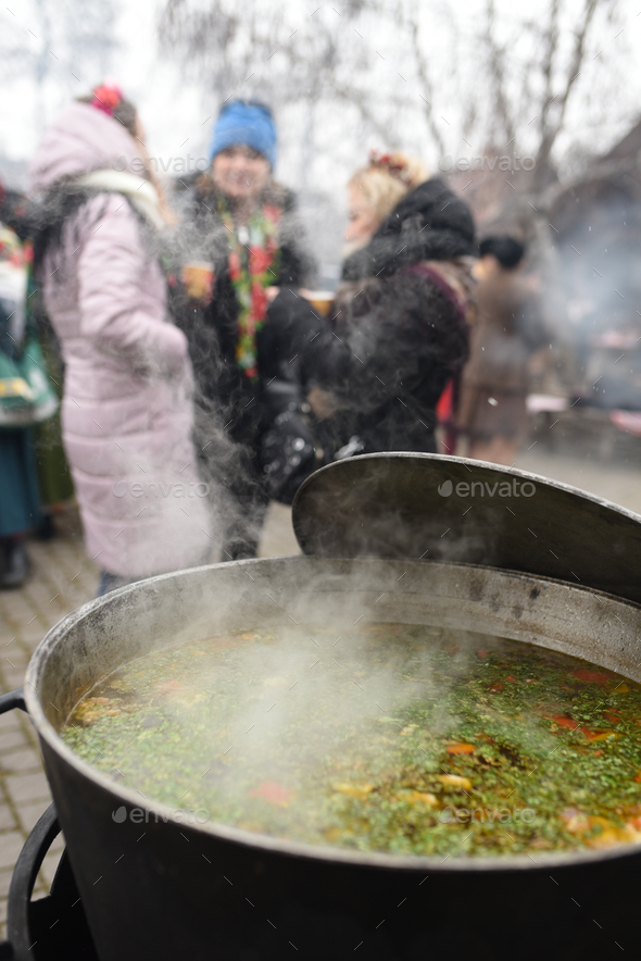 meat soup with herbs and spices boils over the fire Stock Photo by ...
