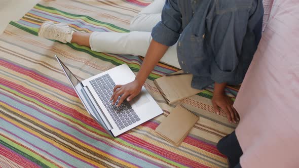 Student Using Computer on Floor, Stock Footage | VideoHive
