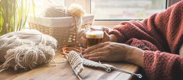 Knitting from threads at home. Hobby, relaxation, meditation, mental ...