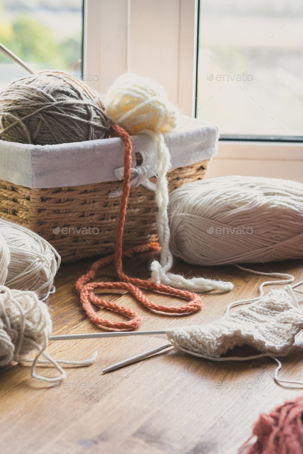 Knitting from threads at home. Hobby, relaxation, meditation, mental ...