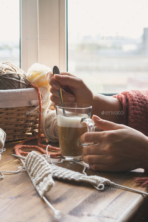 Knitting from threads at home. Hobby, relaxation, meditation, mental ...