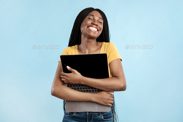 Joyful Black Woman Hugging Laptop Standing Over Blue Background Stock ...