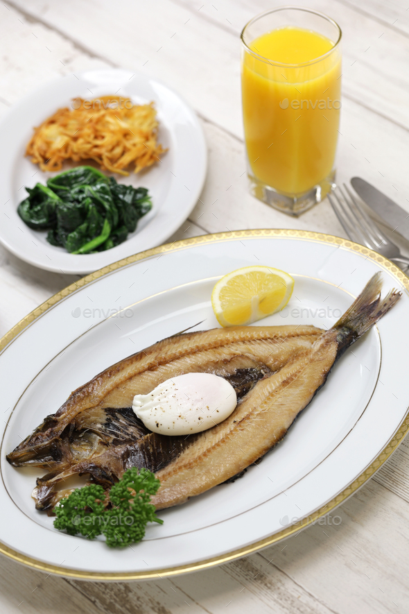 kipper and poached egg, traditional British breakfast dish Stock Photo ...