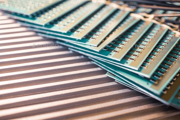 Close-up side view of a panel of SMD resistors Stock Photo by YouraPechkin