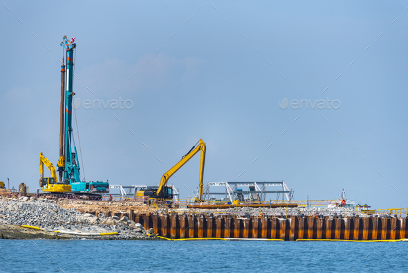 Port construction for industry in Singapore Stock Photo by ckstockphoto