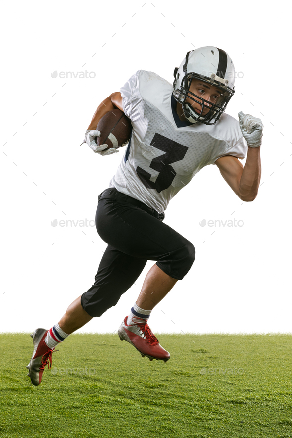 Portrait of American football player training isolated on white studio ...