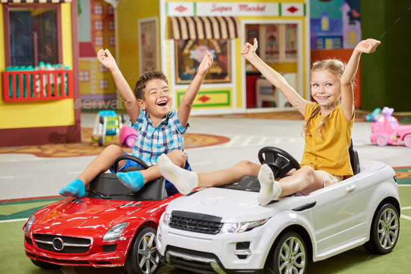 Little boy pushing toy car indoor. Stock Photo by stockfilmstudio ...