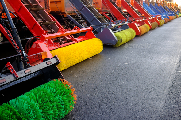 Transport for cleaning city streets. Machines with brushes for removing ...