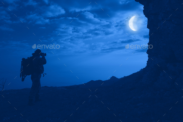 Bottom view silhouette of a male traveler Stock Photo by YouraPechkin