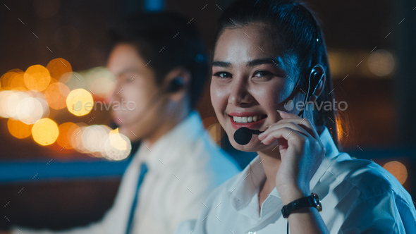 Asia young call center team or customer support service executive using ...