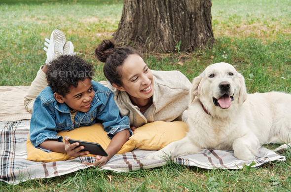 Mother with son resting outdoors Stock Photo by AnnaStills | PhotoDune