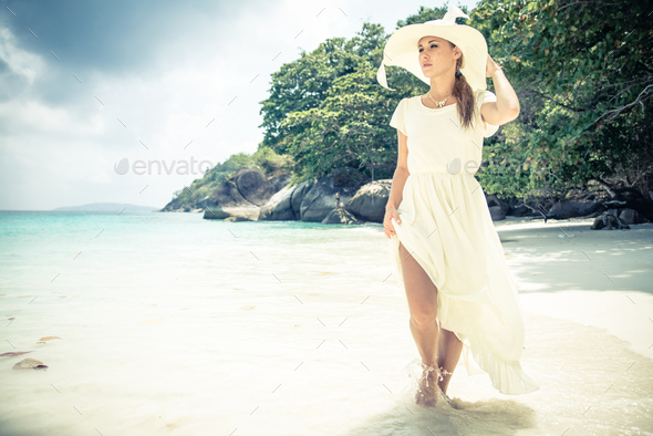Fashion model on tropical beach Stock Photo by oneinchpunchphotos ...