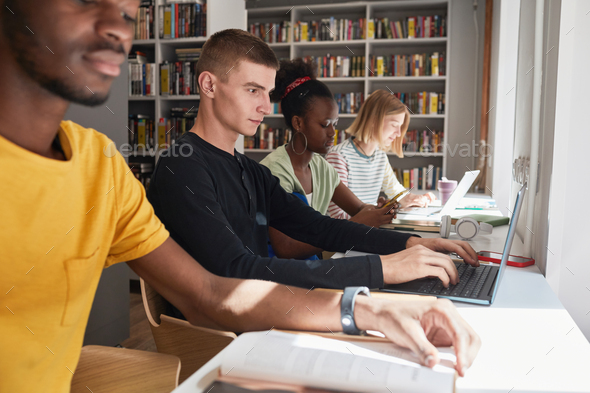 Students in Row at College Stock Photo by seventyfourimages | PhotoDune