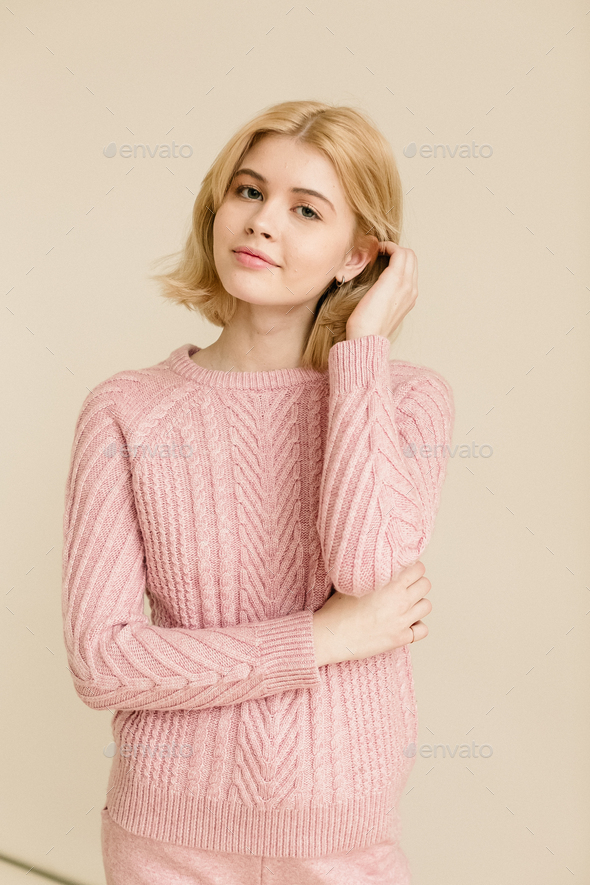 Luxury female model in a dress with sequins and make-up. Gold Confetti ...