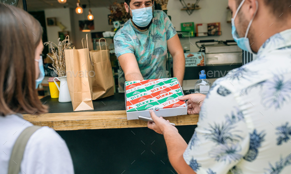 Couple picking up take away food order Stock Photo by davidpereiras
