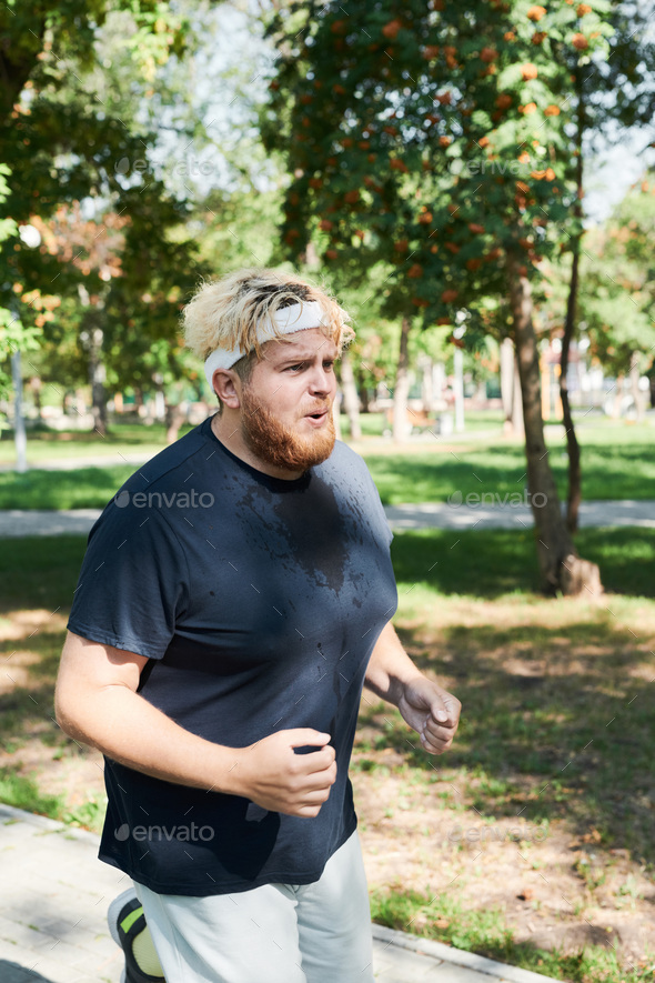 Man running outdoors Stock Photo by AnnaStills | PhotoDune