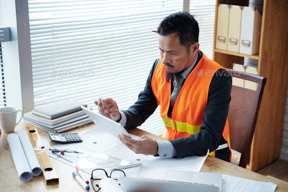 Civil Engineer Filling Document Stock Photo by DragonImages | PhotoDune