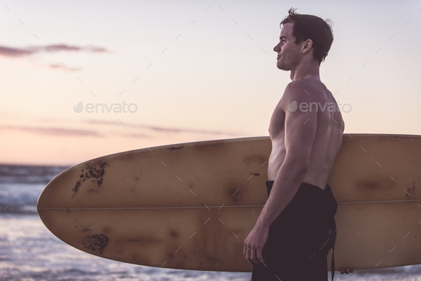 Surfer portrait on the beach Stock Photo by oneinchpunchphotos | PhotoDune