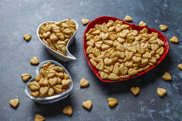 Heart shaped crackers in a heart shaped bowl. Stock Photo by 13people