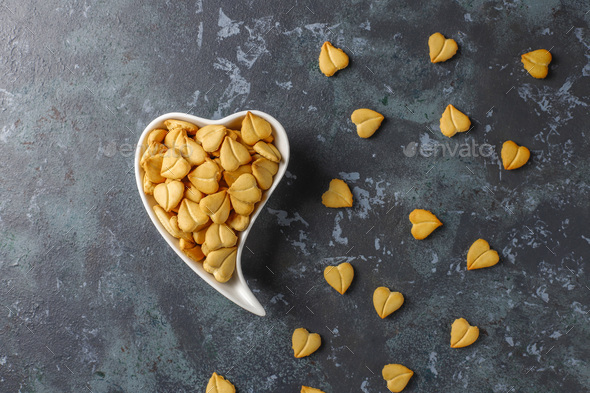 Heart shaped crackers in a heart shaped bowl. Stock Photo by 13people