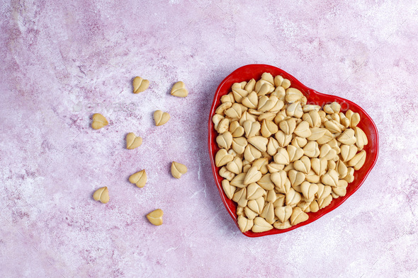 Heart shaped crackers in a heart shaped bowl. Stock Photo by 13people