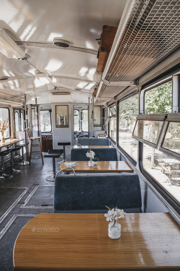 The tables of an old train transformed into a restaurant Stock Photo by ...