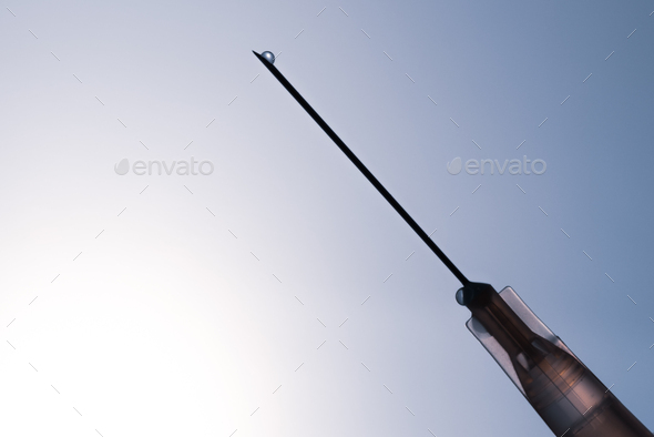 Syringe with solution for injection Stock Photo by Pasanheco | PhotoDune