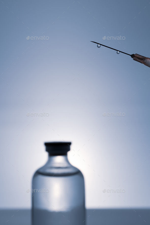 Bottle with solution for injection and injection needle Stock Photo by ...