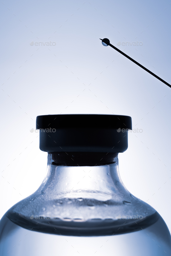 Bottle with solution for injection and syringe with drops on top Stock ...