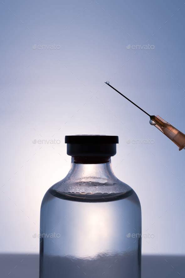 Bottle with solution for injection and syringe with drops on top Stock ...